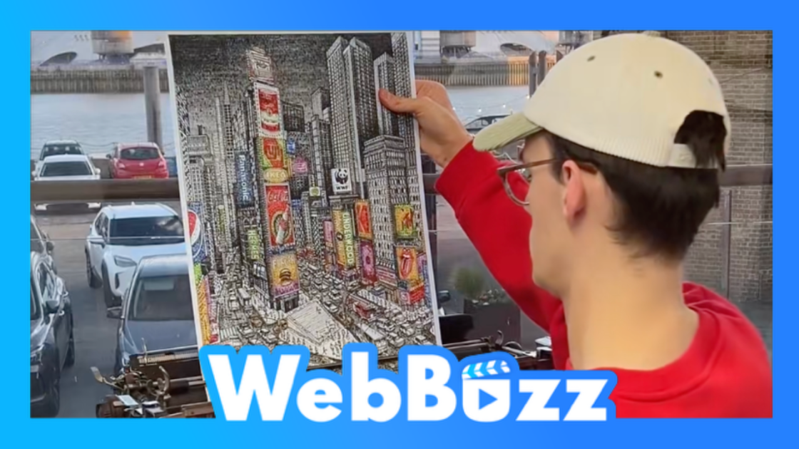 Il dessine avec une machine à écrire